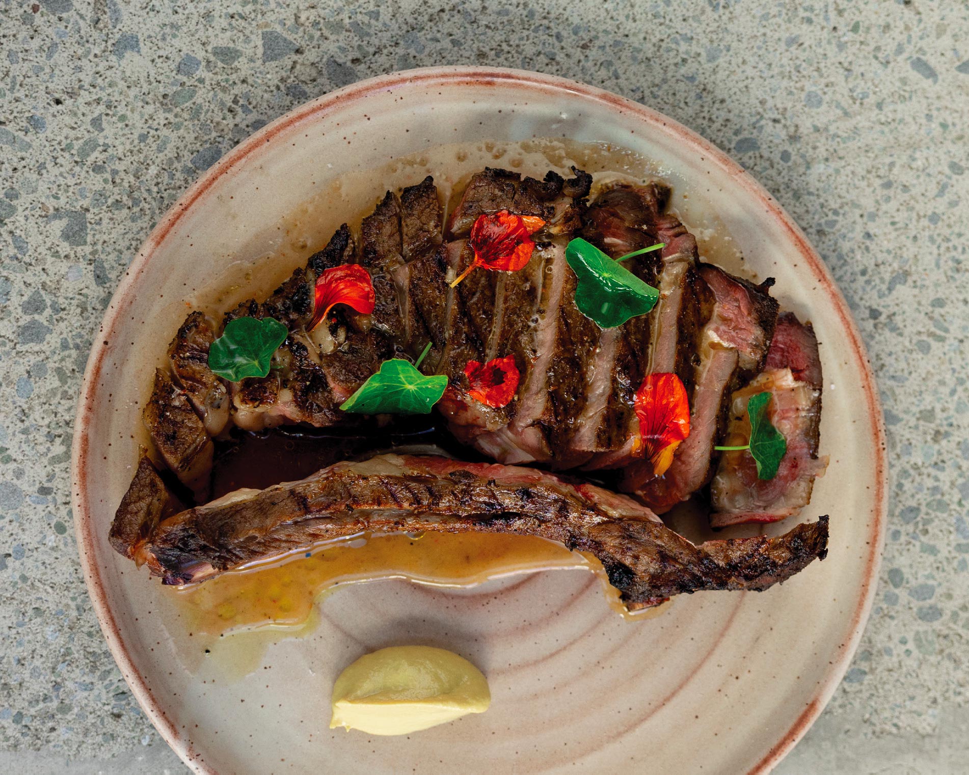 BBQ Veal ribeye chop with house mustard and spiced jus - Dairy Country